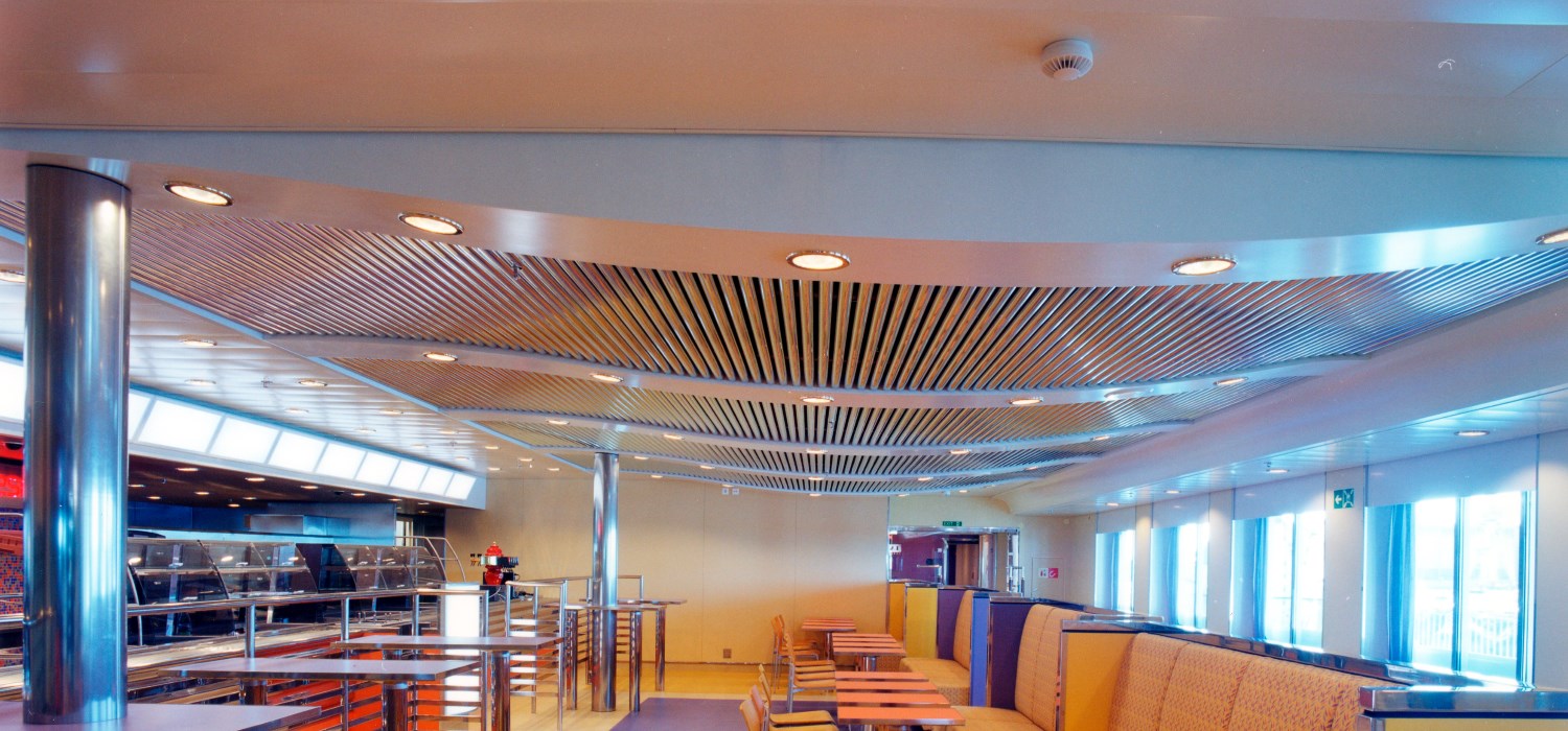 Free "rain-fall" air conditioning in metal ceilings - Lautex Oy